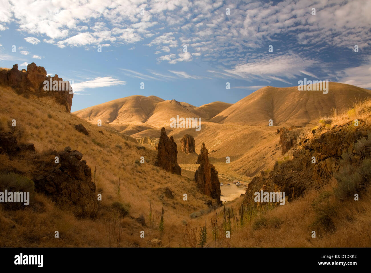 Spires of weathered volcanic tuff on steep hilliside above Slocum Creek ...