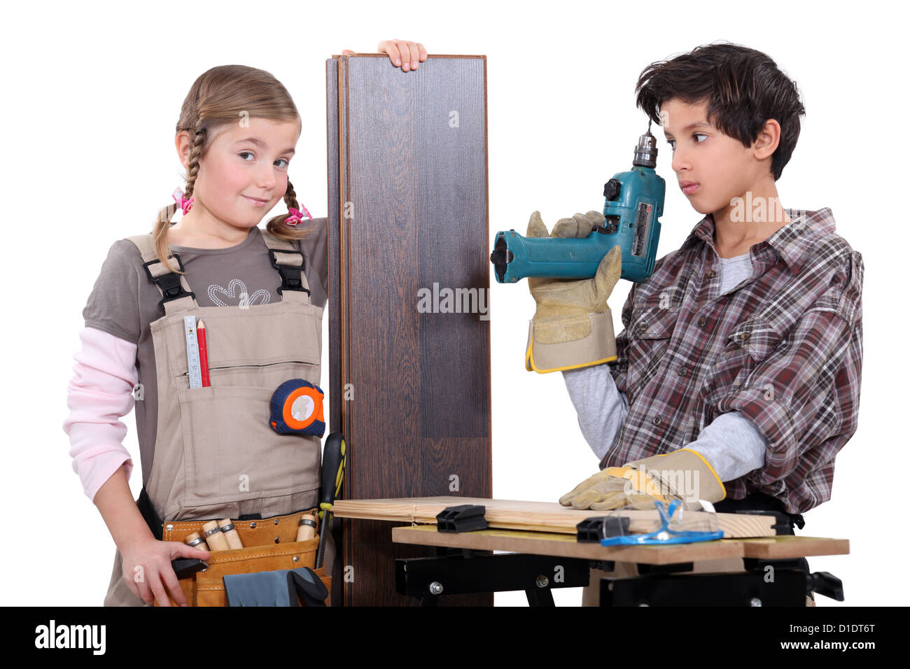 Little boy and girl with power tools Stock Photo - Alamy