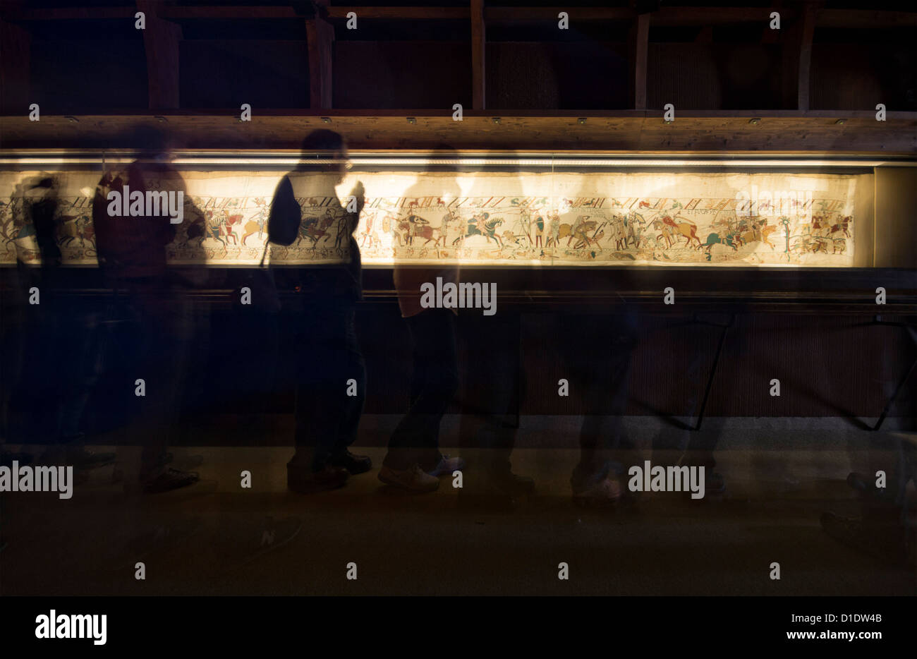 Bayeux, France. Tourists look at the famous tapestry which depicts the ...