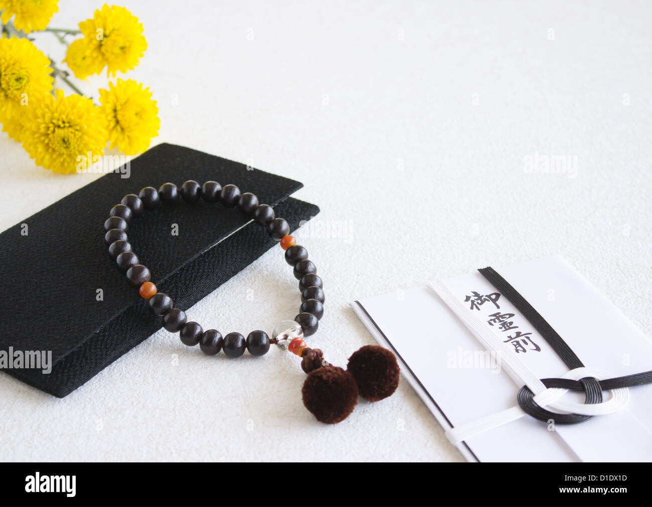 Buddhist rosary and a condolence-money envelope (Mourning image Stock ...
