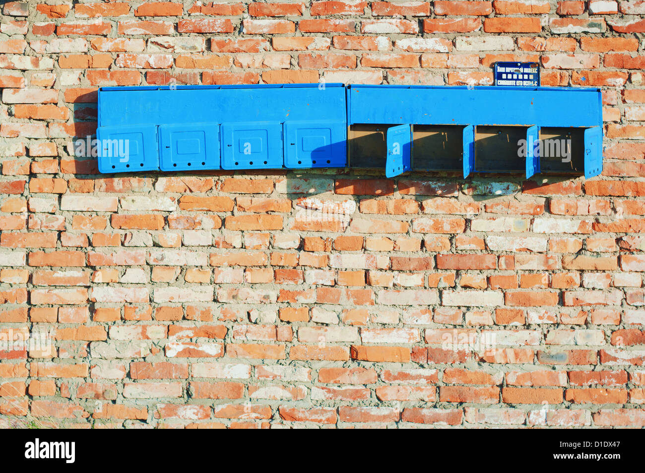 Background - aged red brick construction wall with old post boxes Stock ...