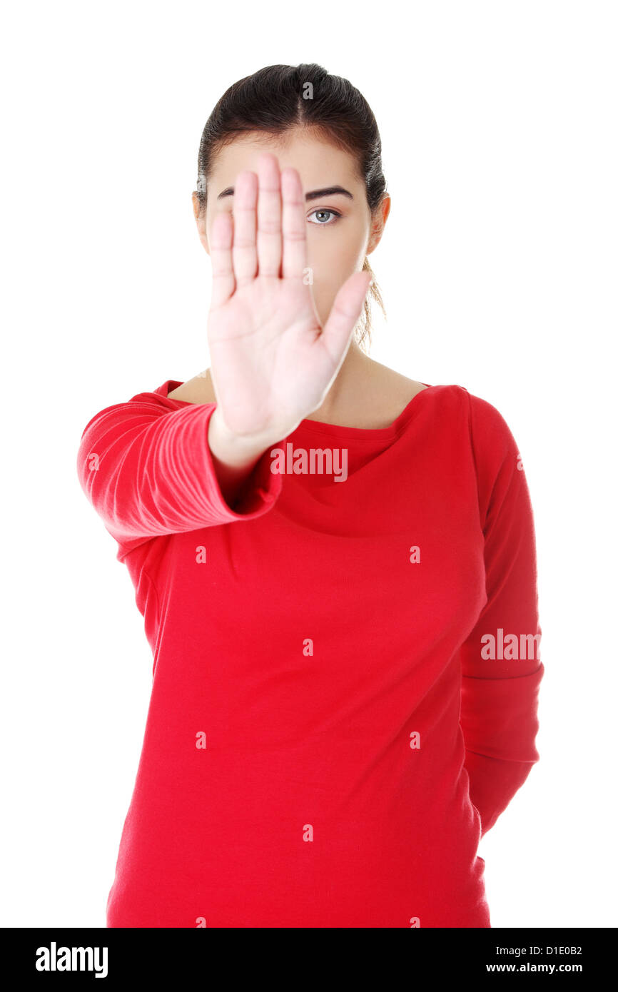 Hold on, Stop gesture showed by young woman hand Stock Photo - Alamy