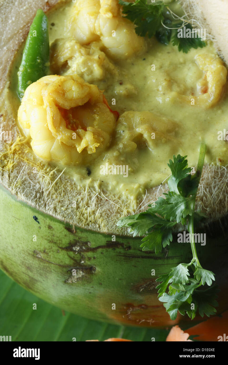 Daab chingri malai curry a bengali dish Stock Photo - Alamy