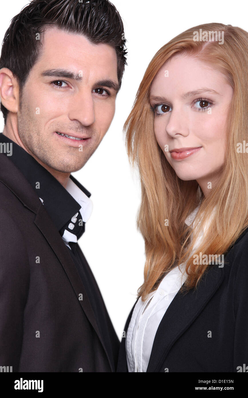 A couple getting ready for the day Stock Photo - Alamy