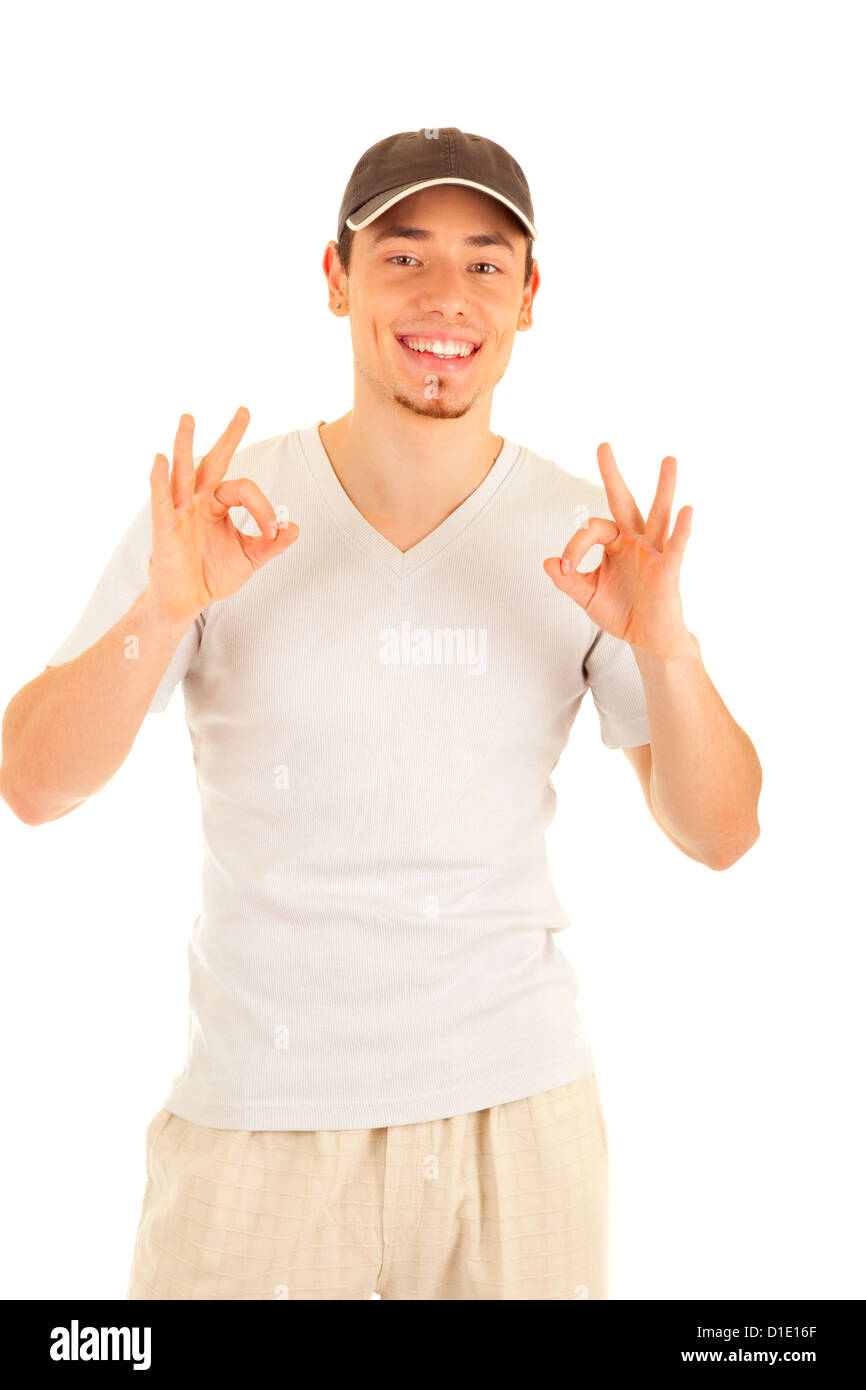 Young smiling worker shows Ok sign by two hands. Isolated on white ...
