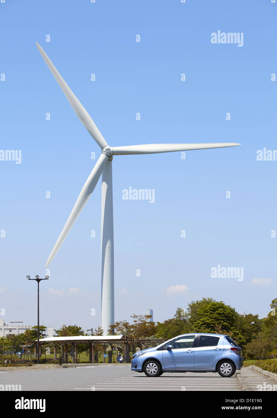 Wind turbine and a car Stock Photo - Alamy