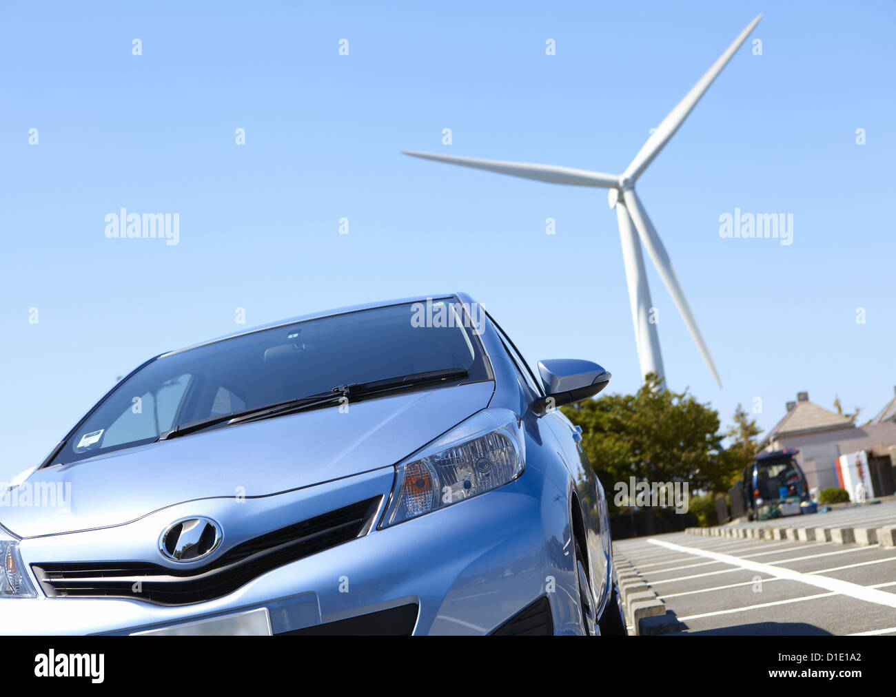 Wind turbine and a car Stock Photo - Alamy