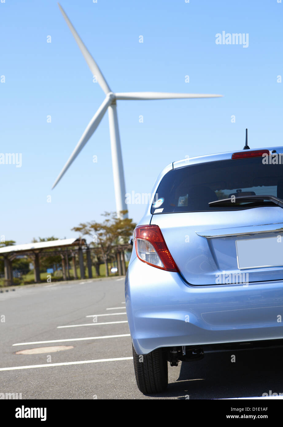 Wind turbine and a car Stock Photo - Alamy