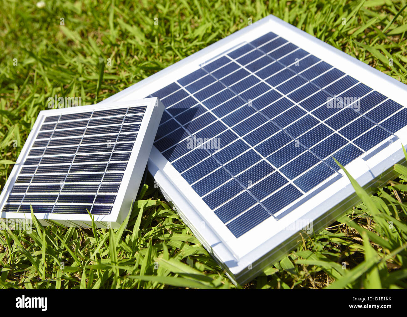 Solar panels on a lawn Stock Photo - Alamy