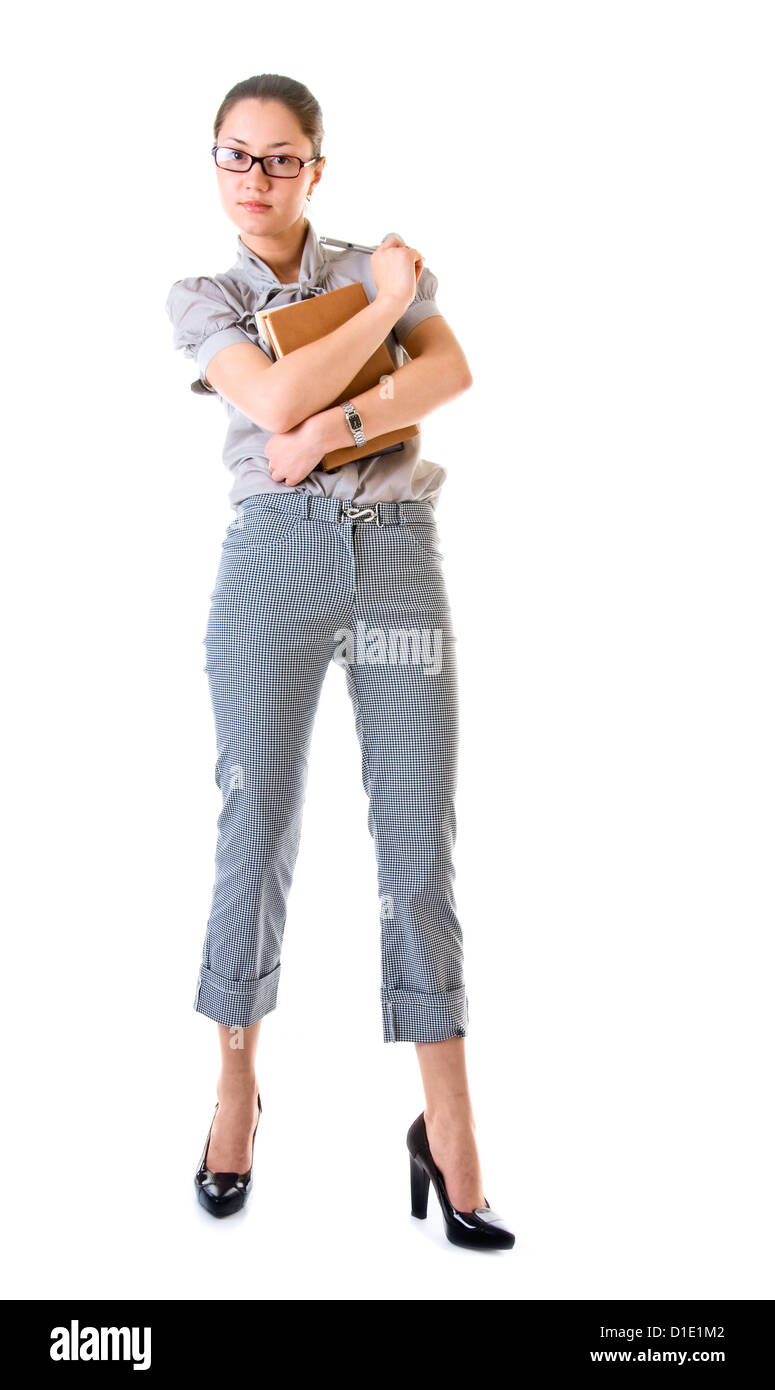 Intelligent serious standing woman in glasses with books isolated on ...