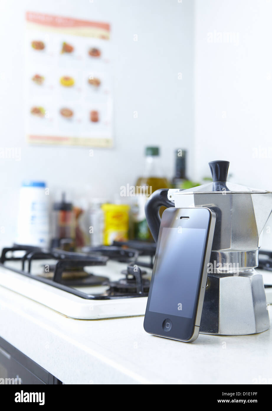 Smartphone in a kitchen Stock Photo - Alamy