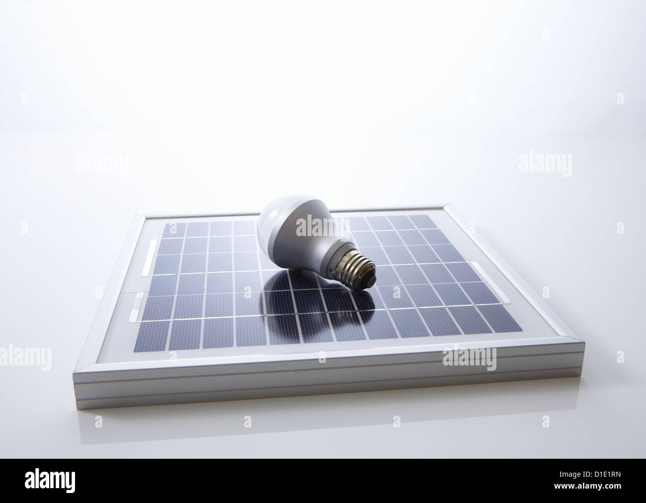 Solar panel and a LED bulb Stock Photo - Alamy