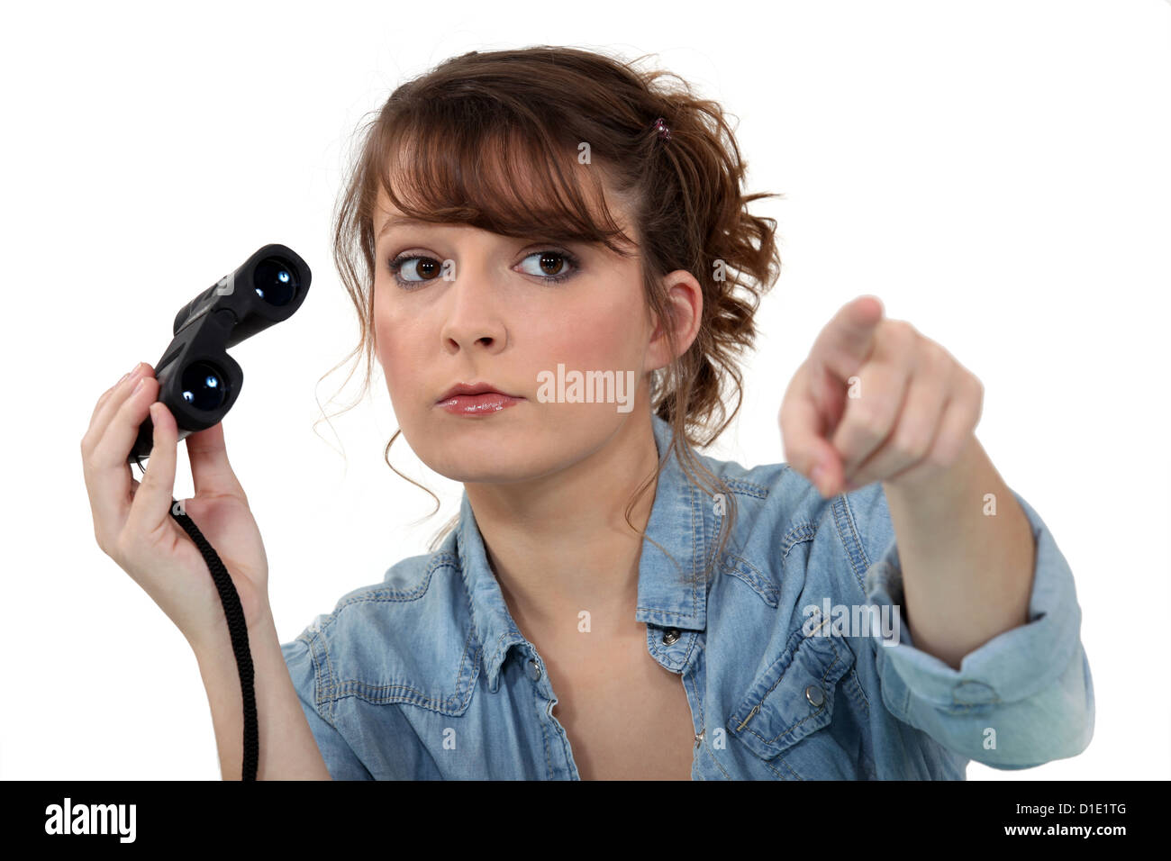Woman looking intently at something Stock Photo - Alamy