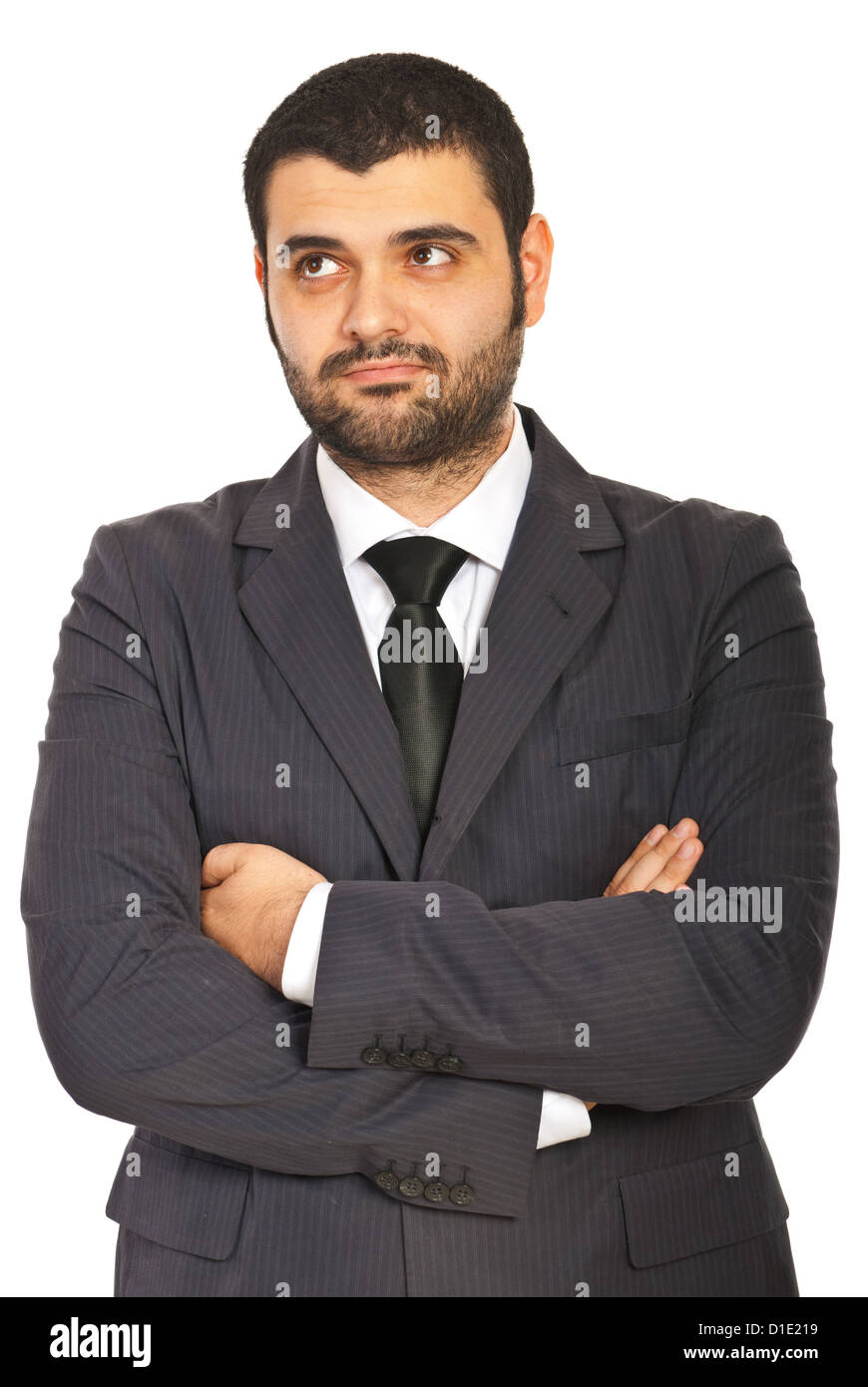 Confused business man standing with hands crossed isolated on white ...