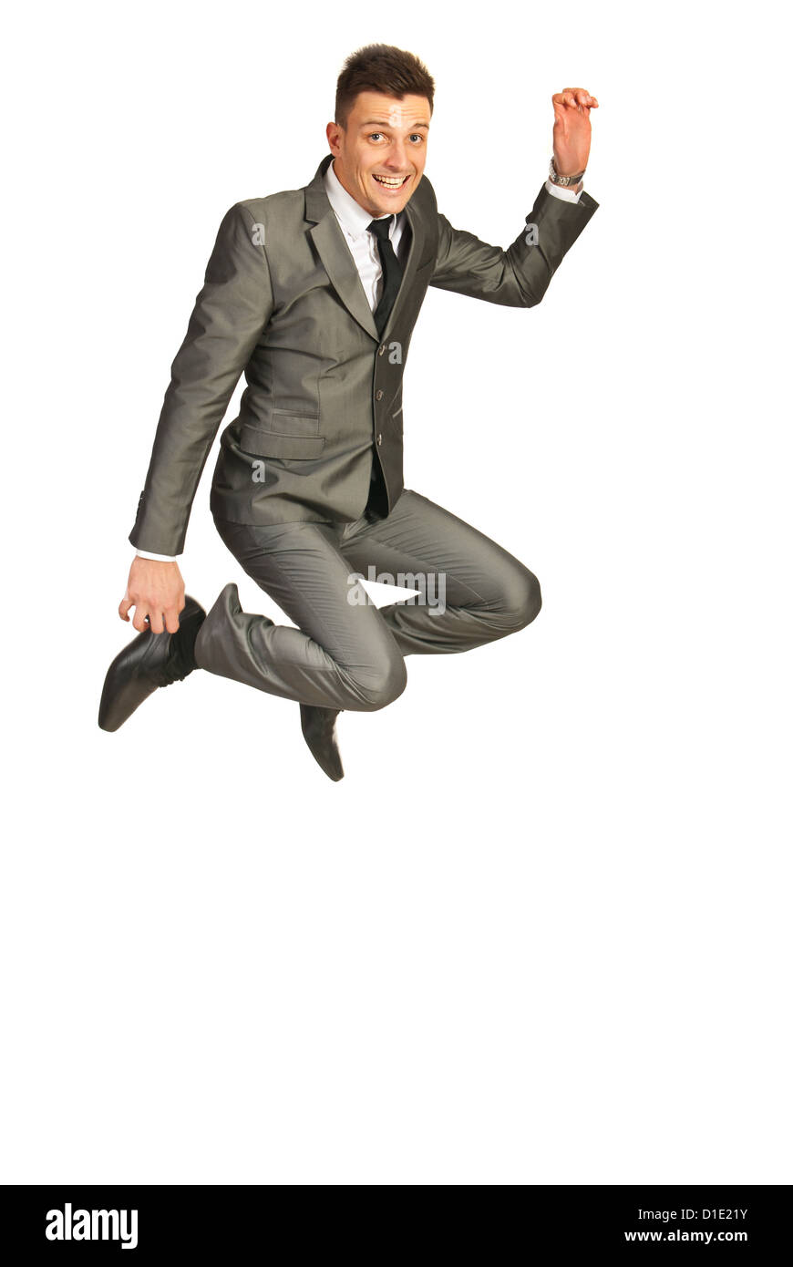 Cheerful business man jumping isolated on white background Stock Photo ...