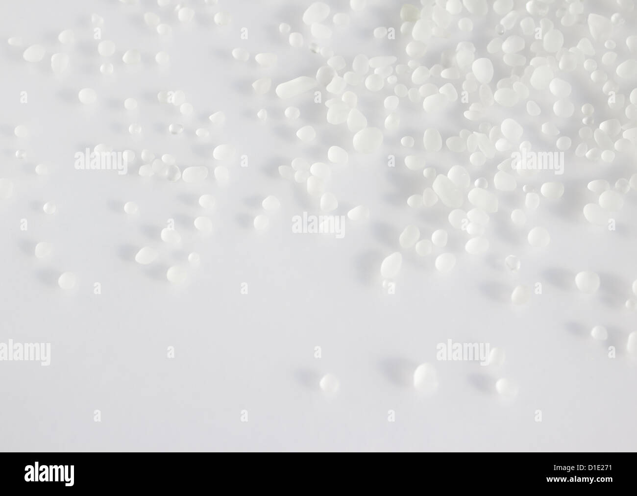 Grains of white glass Stock Photo - Alamy