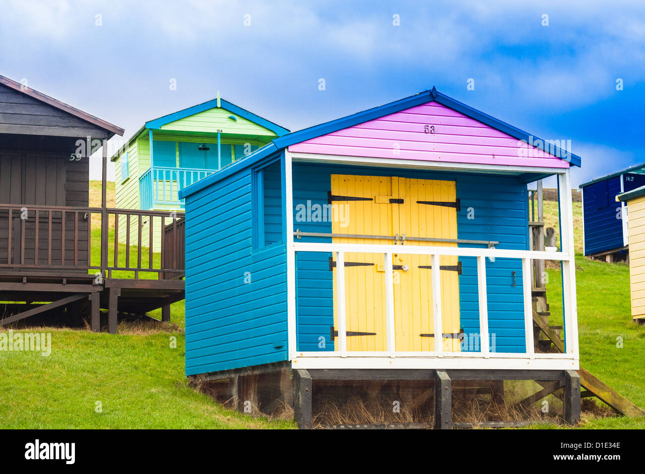 Colorful beach huts Stock Photo - Alamy