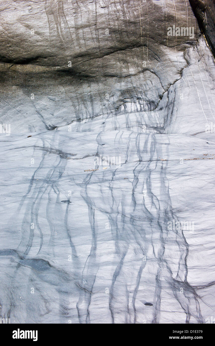 Rock formations on the beach and cliffs at Ayrmer Cove, Ringmore, Devon ...