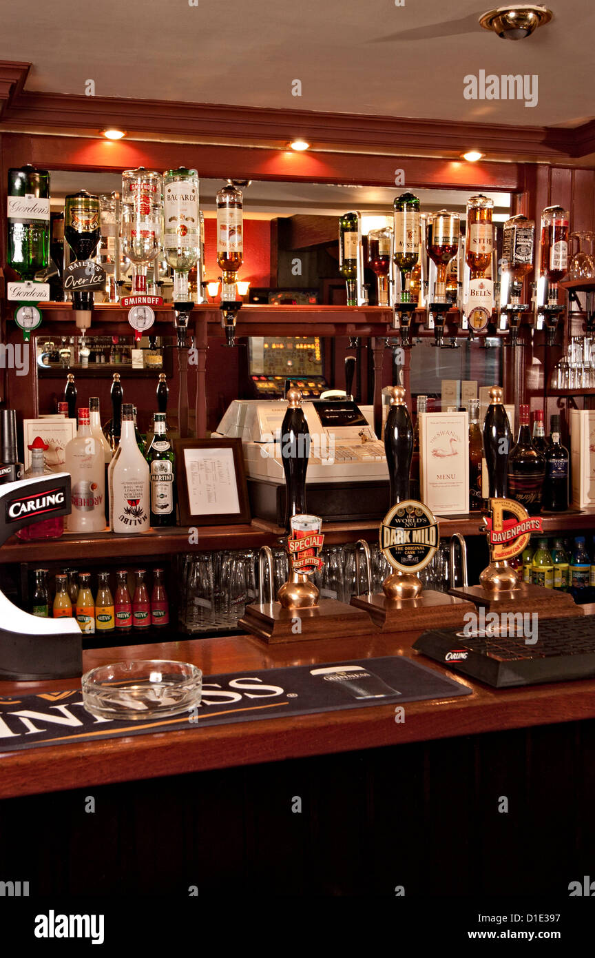 the swan inn pub beer pumps Stock Photo - Alamy