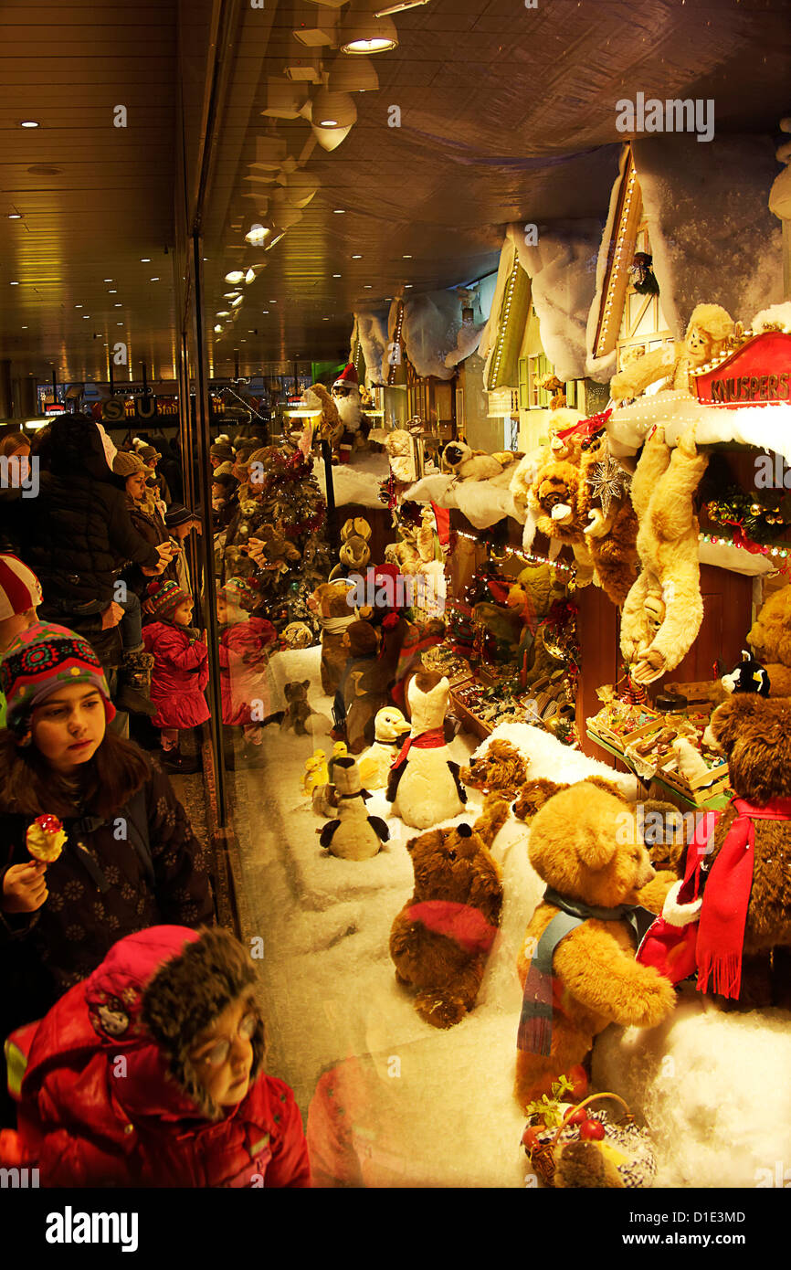 People looking at a Christmas shop window display, Munich Upper Bavaria ...