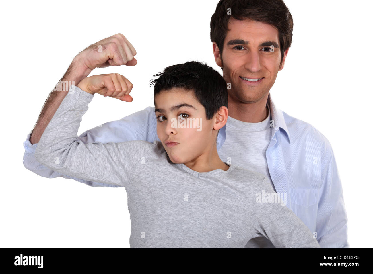 father and son showing muscles Stock Photo - Alamy
