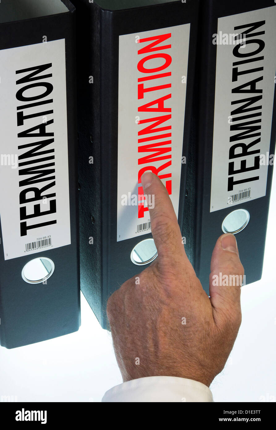 Symbol image, hand pointing to a file folder labeled termination Stock ...
