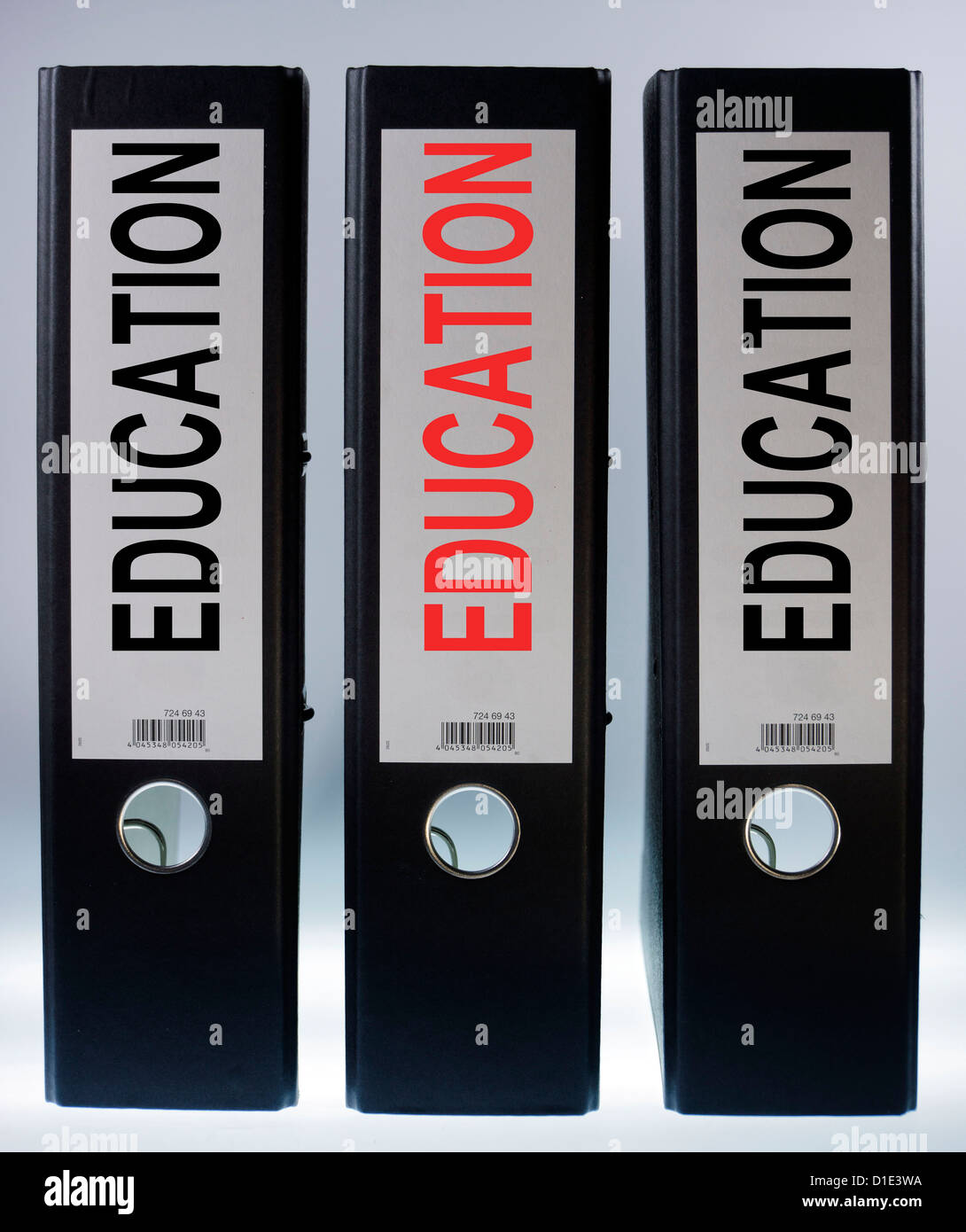 Education, Symbol image,hand pointing to a file folder Stock Photo - Alamy