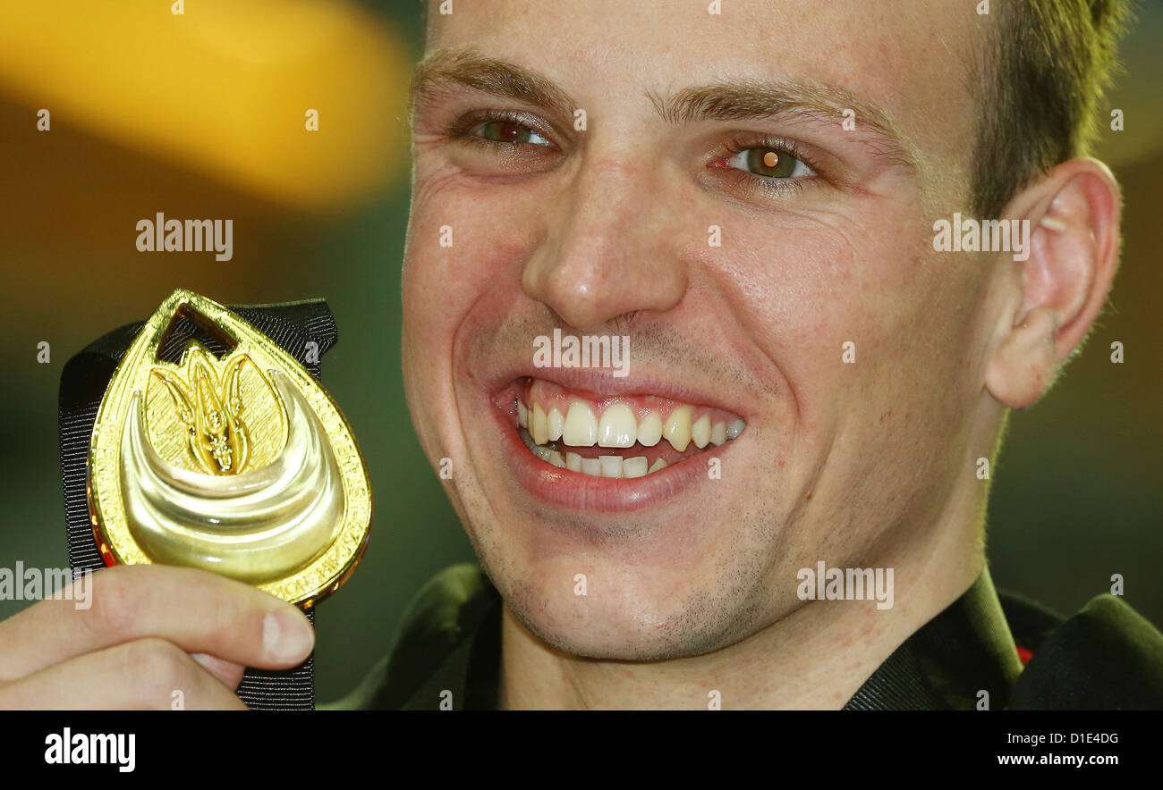 Paul Biedermann of Germany shows his gold medal after winning the men's ...