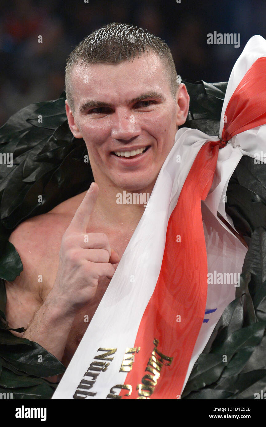 Polish boxer Mateusz Masternak gestures after winning the European ...