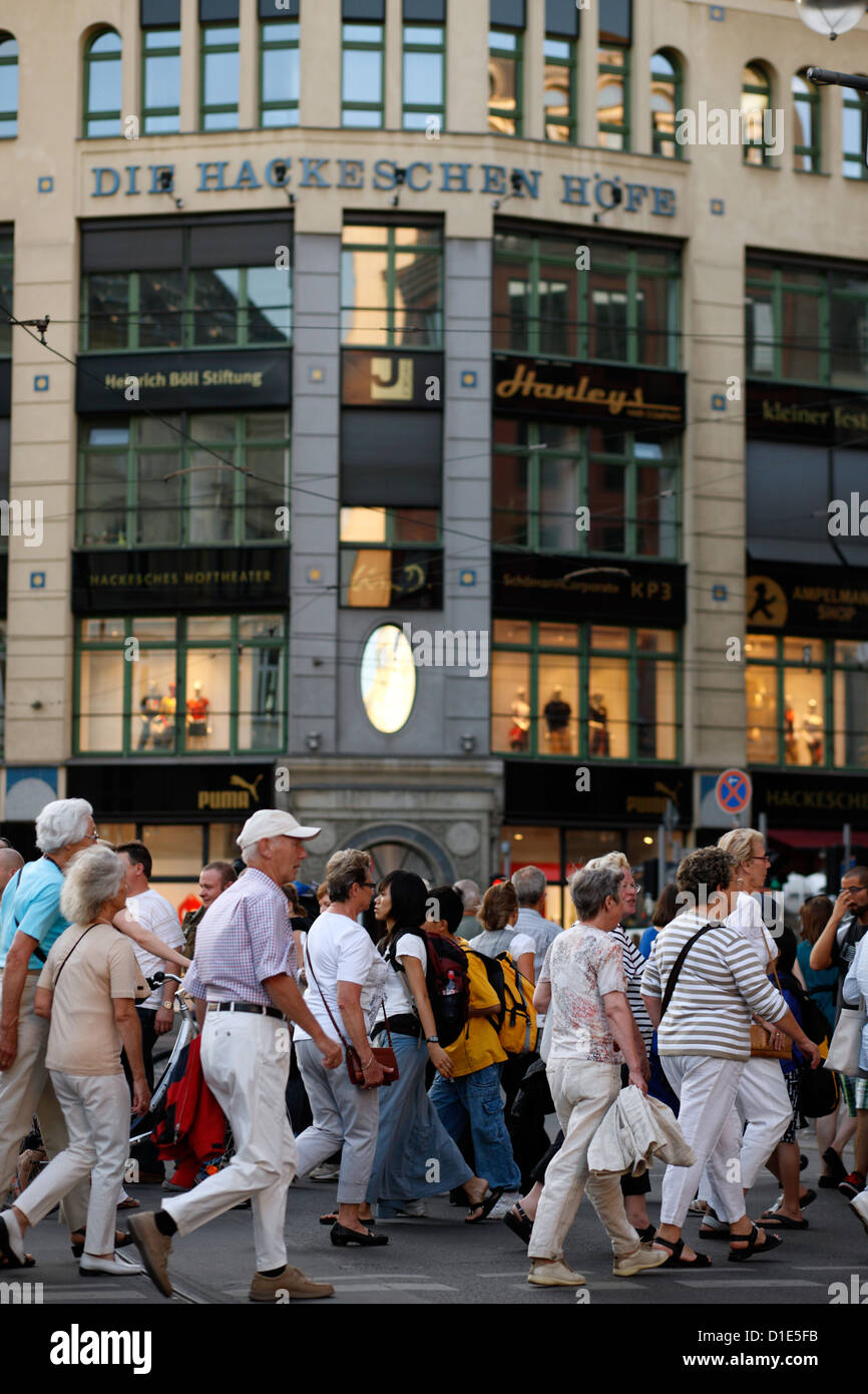Berlin, Germany, pedestrians cross the street in front of the ...
