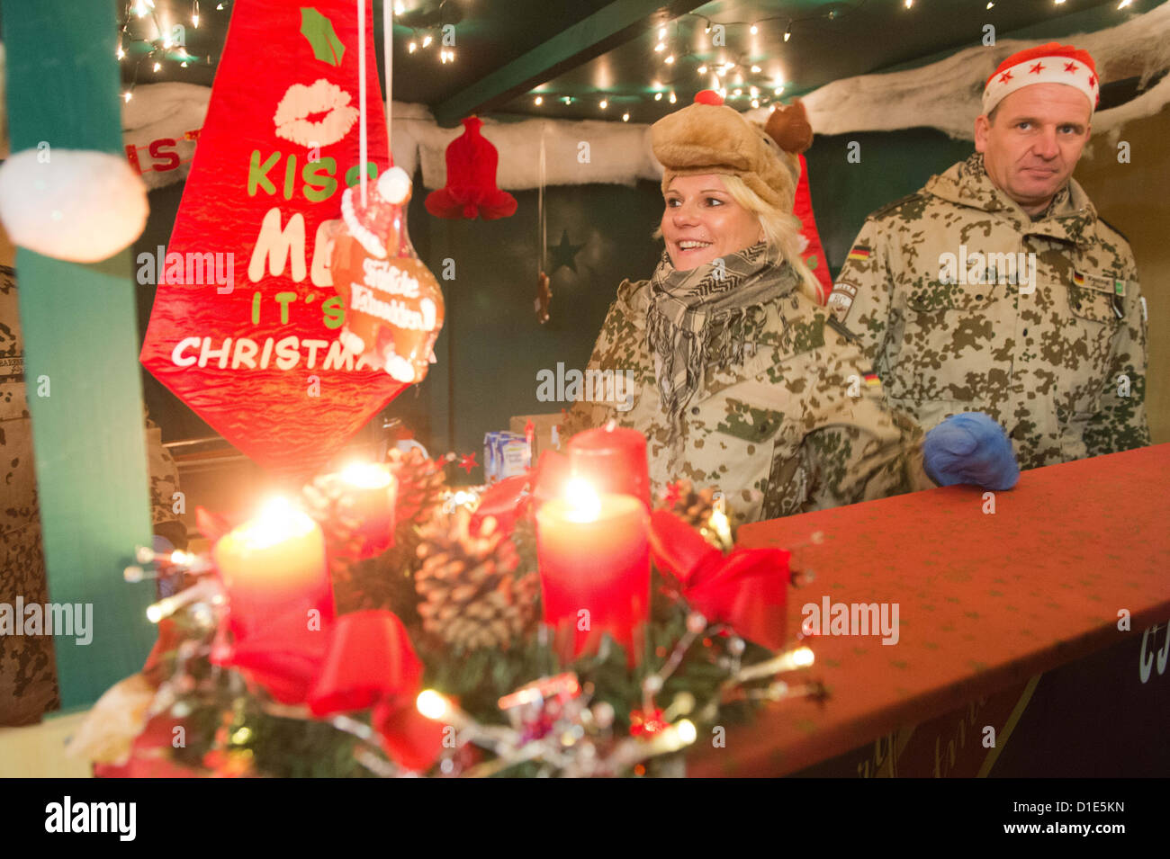 German soldiers sell waffles and Christmas cookies in the Camp Marmal ...