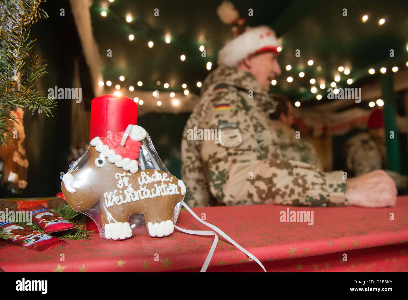 German soldiers sell waffles and Christmas cookies in the Camp Marmal ...