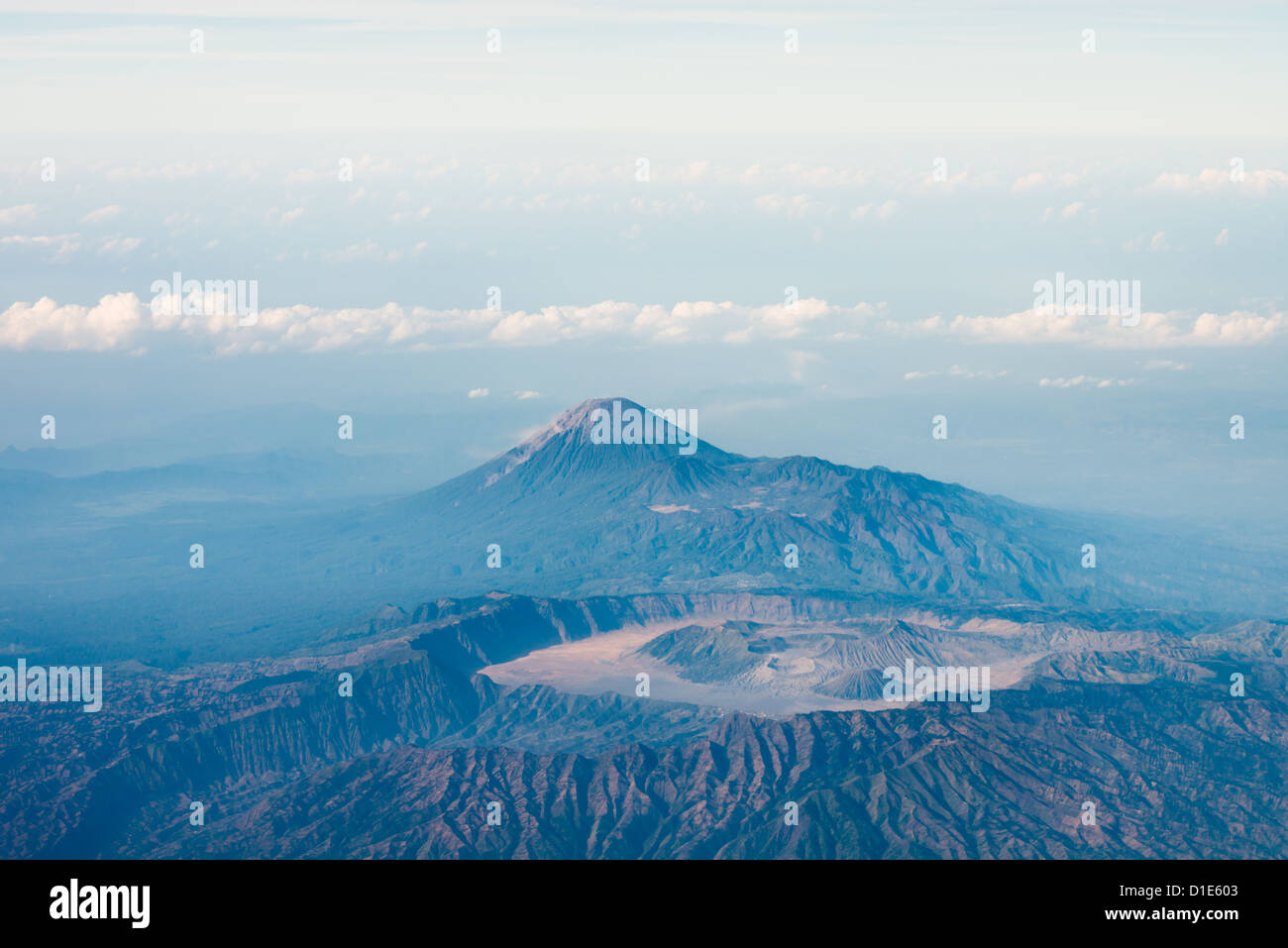 Big volcano crater with other volcano top on background, bird's eye ...