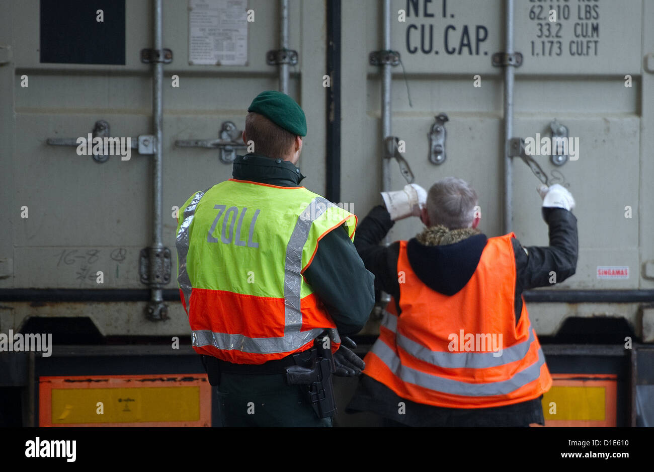Customs officers check the freight of a truck at the Free Harbour ...