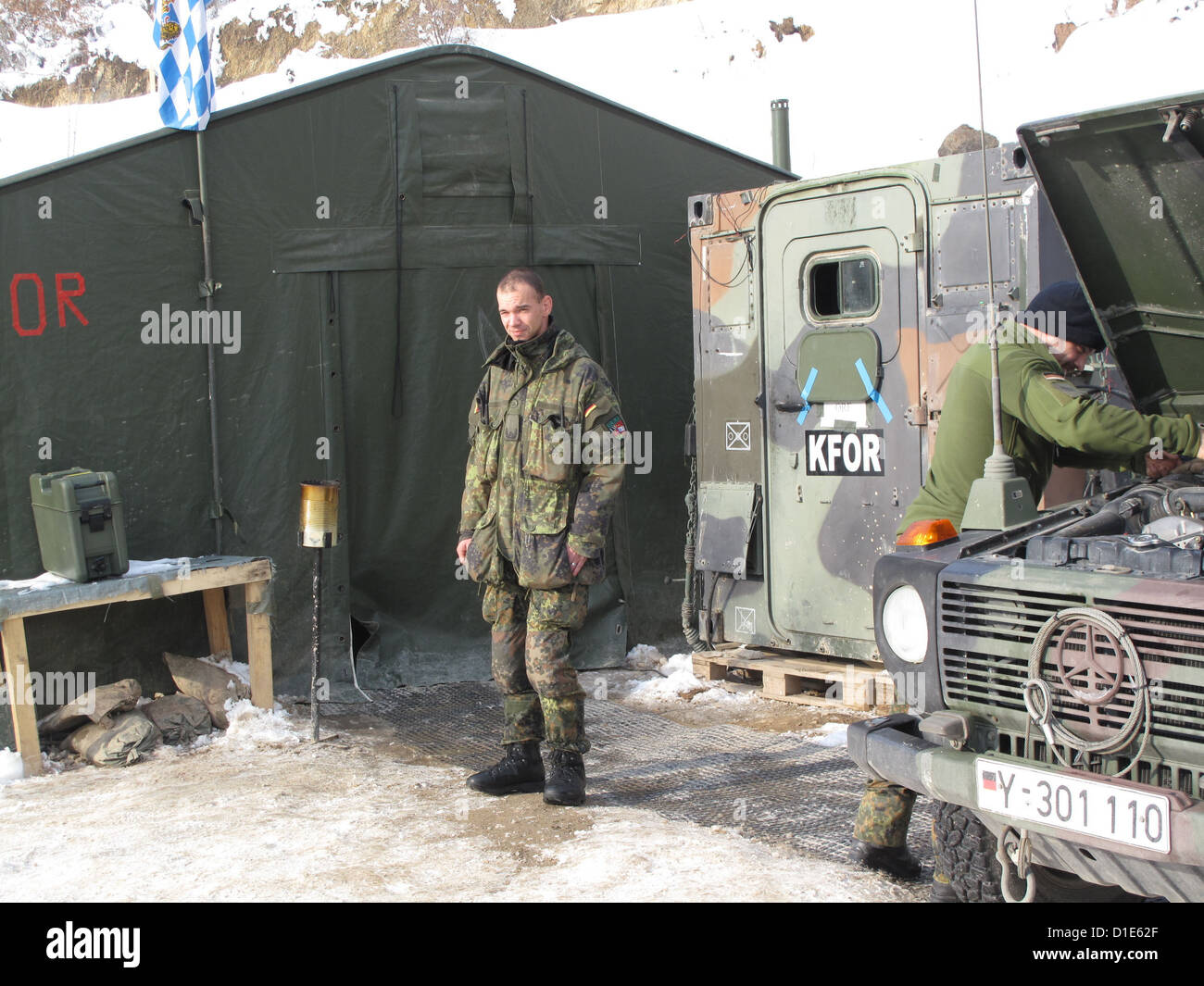 Major W, infantry commander of the Bundeswehr, is pictured next to a ...