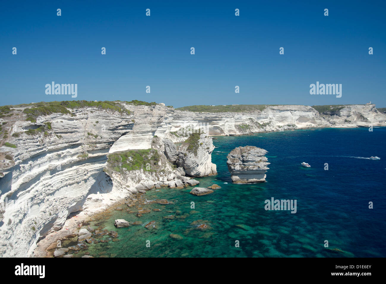 White limestone cliffs above emerald sea in Bonifacio, Corsica, France ...