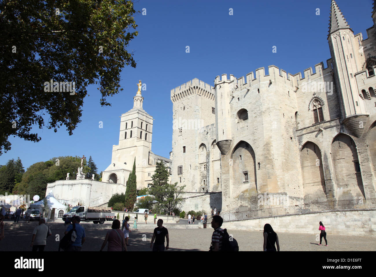 Exterior of Palais des Papes, UNESCO World Heritage Site, and church ...