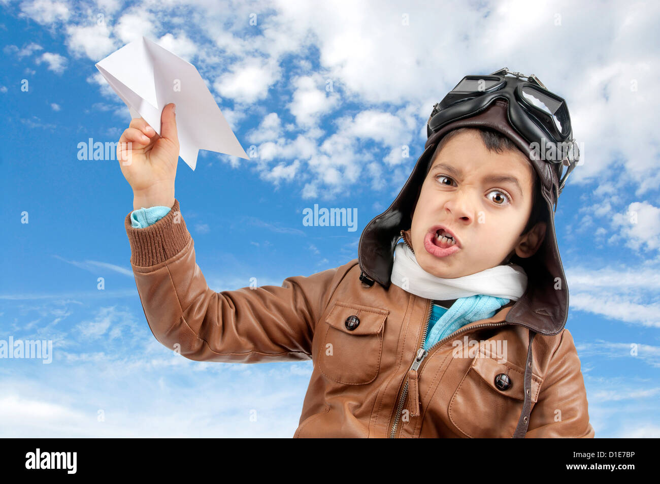 Young boy pilot flying a paper plane Stock Photo - Alamy