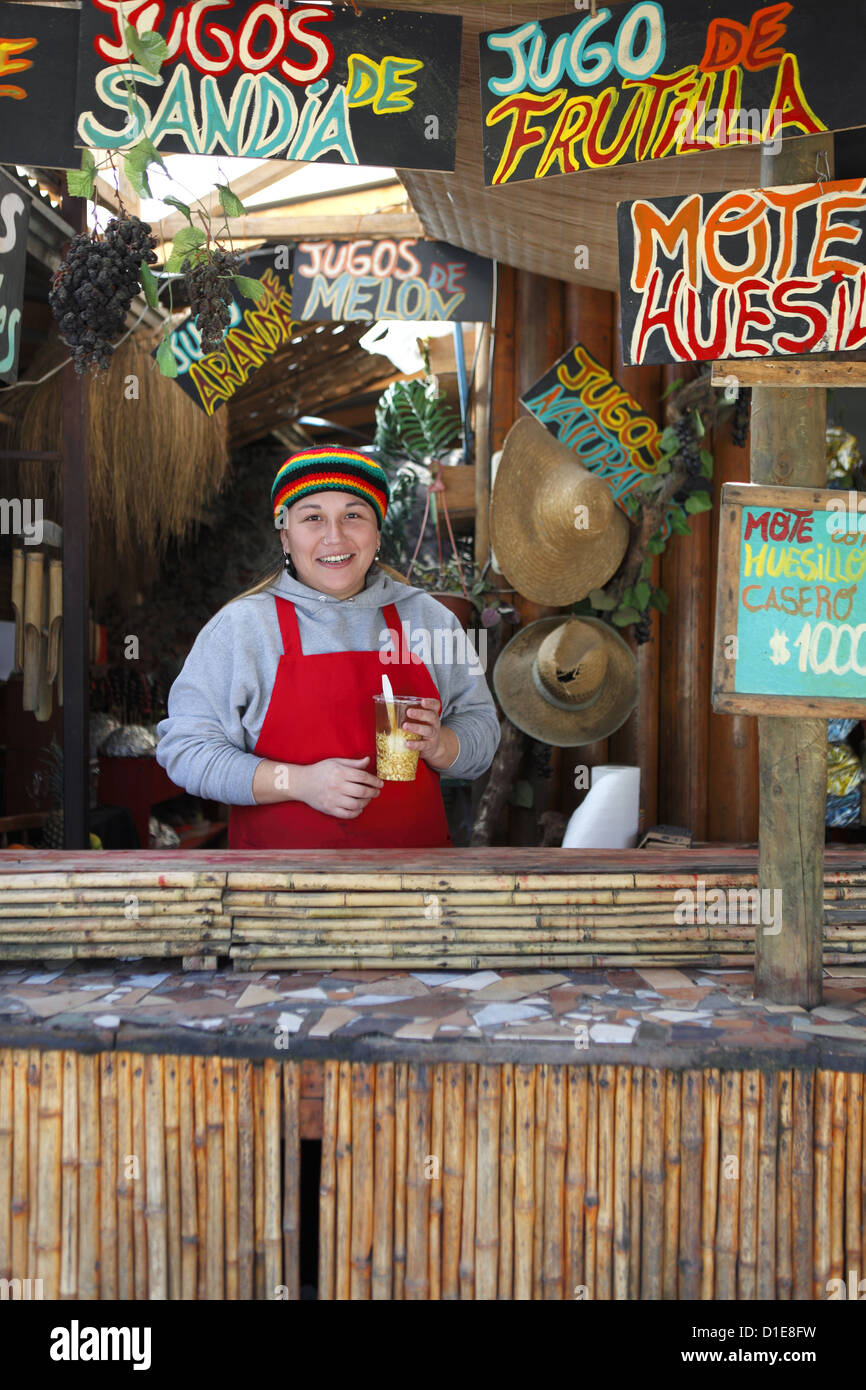 Cafe stall selling mote con huesillo (dried peach cordial with wheat ...