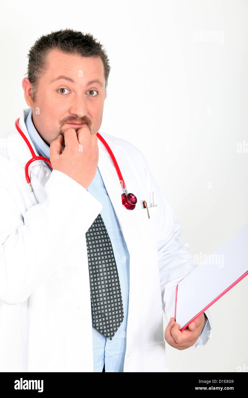 doctor scratching his chin Stock Photo - Alamy