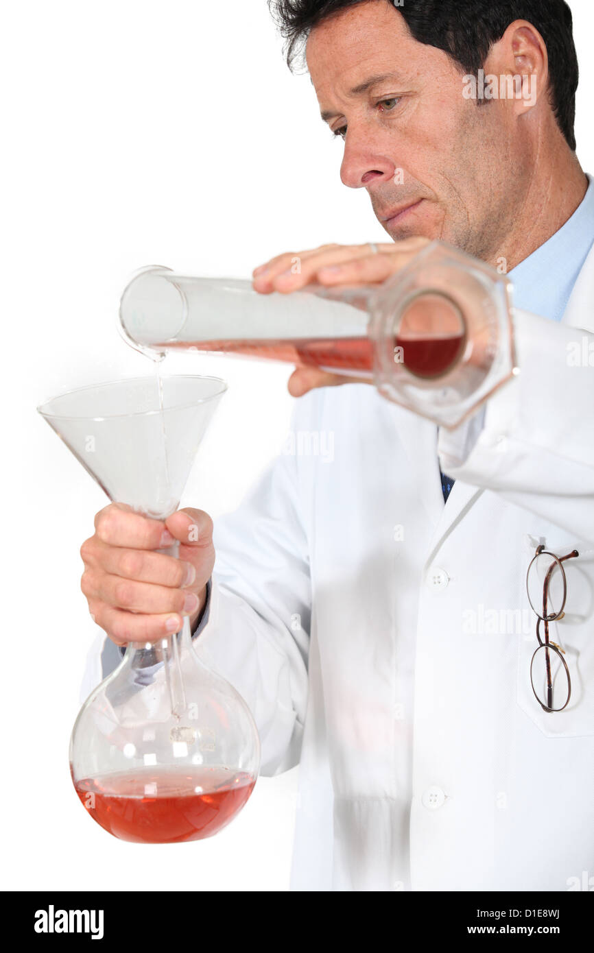 Man in laboratory conducting experiment Stock Photo - Alamy