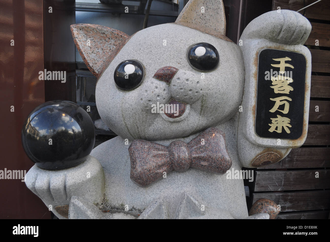 Naha (Okinawa, Japan), ‘good luck neko’ (cat) statue at the entrance of ...