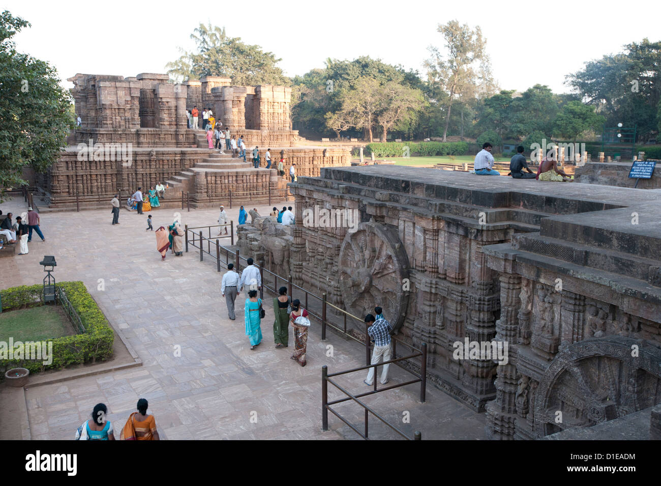 Visitors at the Konarak Sun temple, built as a chariot for Surya, the ...