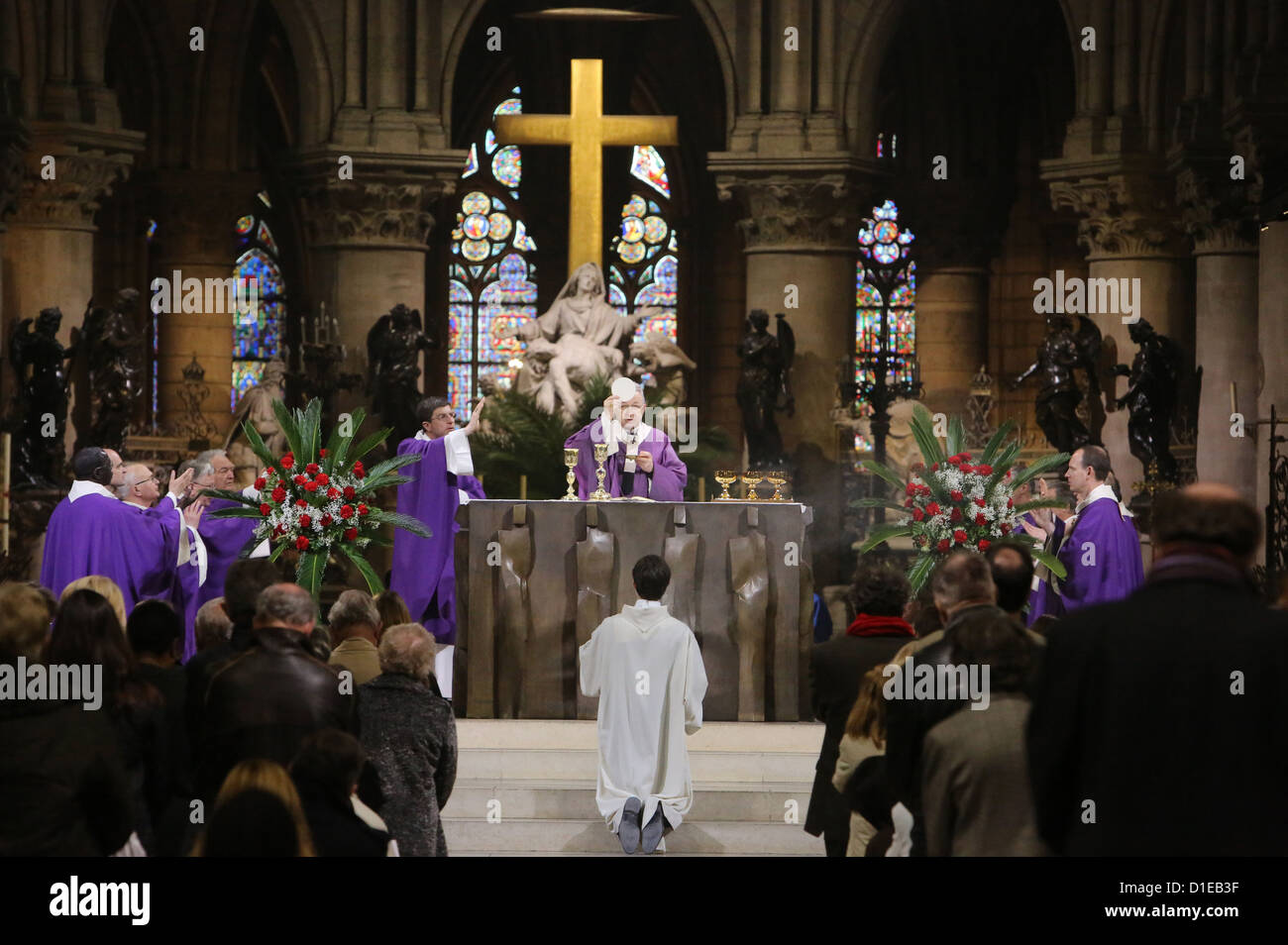Paris archbishop Andre Vingt-Trois saying Mass at Notre Dame Cathedral ...