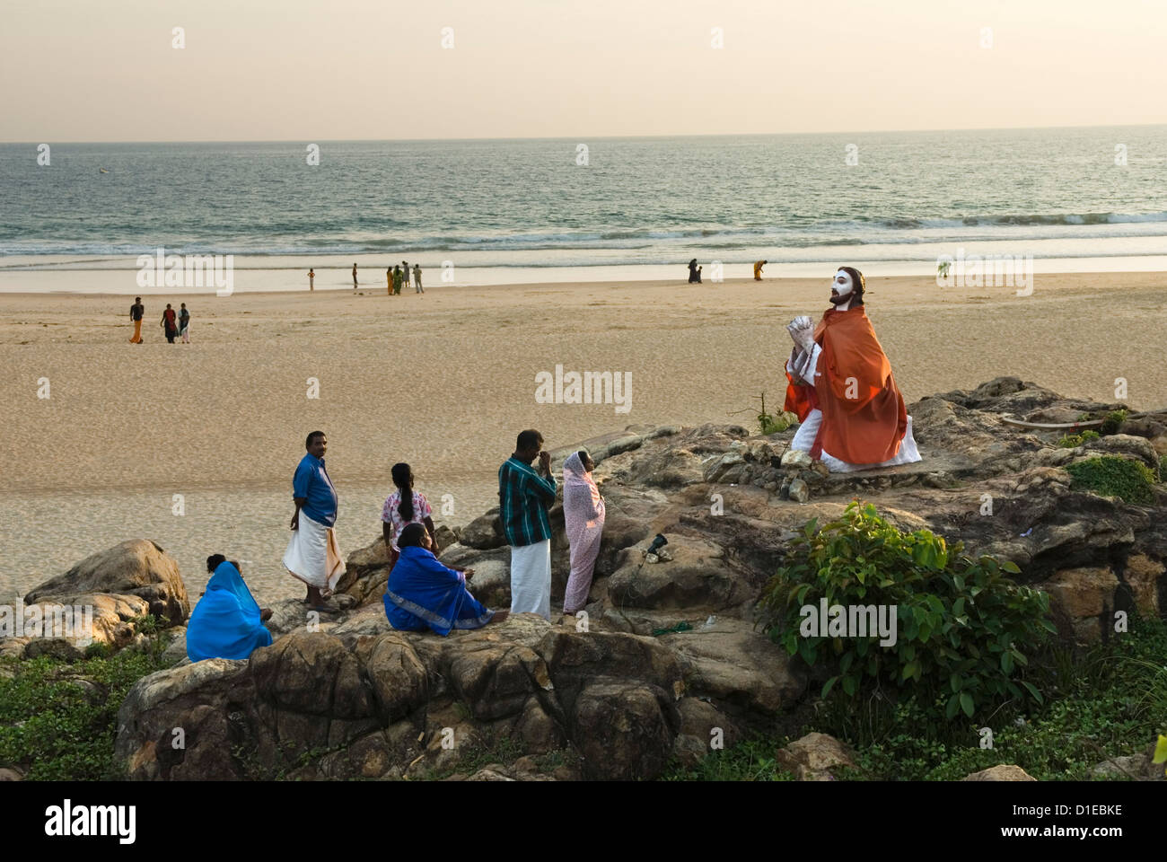 Christian worshippers in evening, Chowara Beach, near Kovalam, Kerala ...