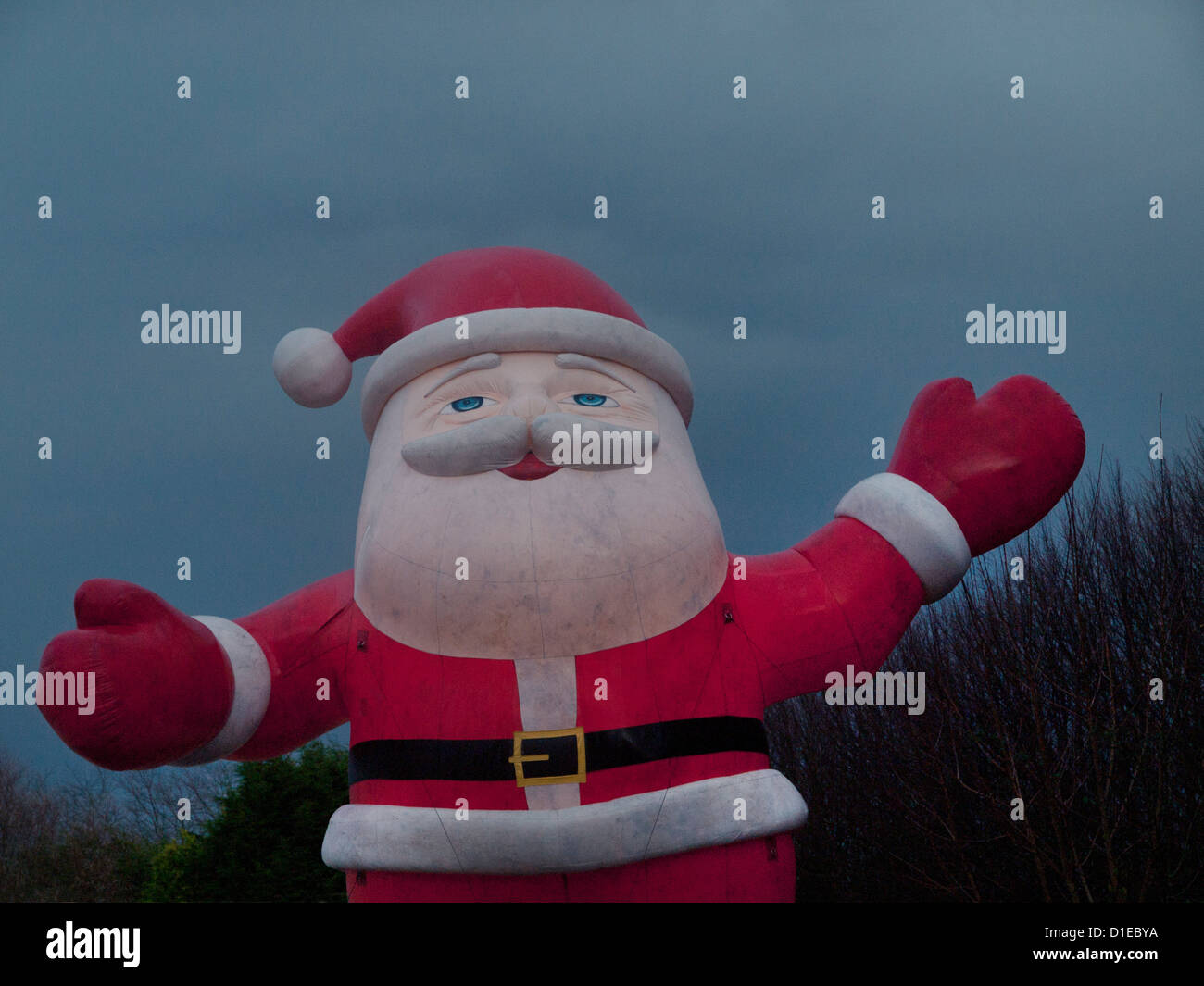 Inflatable Santa outside a garden center in England Stock Photo - Alamy