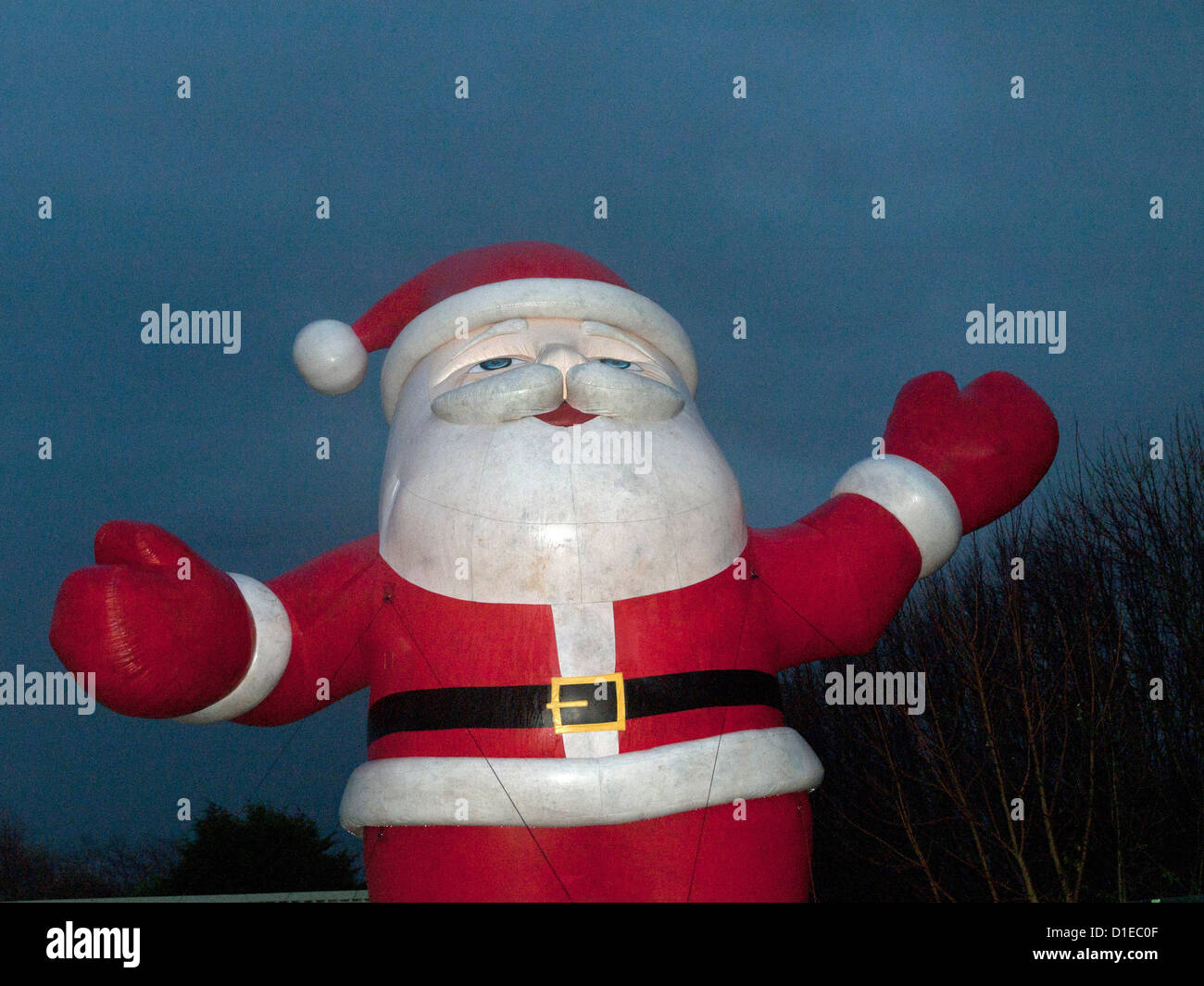 Inflatable Santa outside a garden center in England Stock Photo - Alamy
