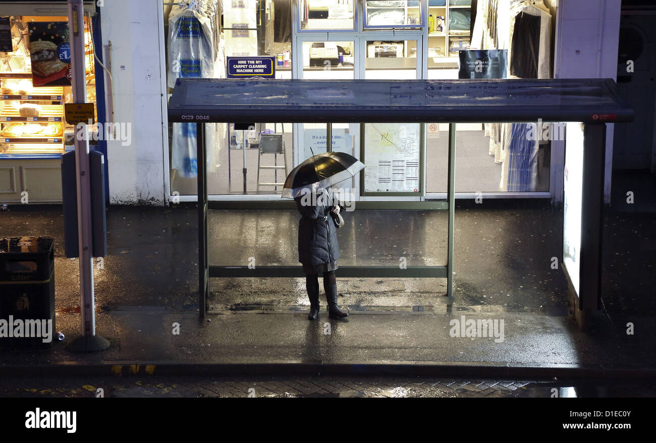 Bus stop uk london woman waiting hi-res stock photography and images ...