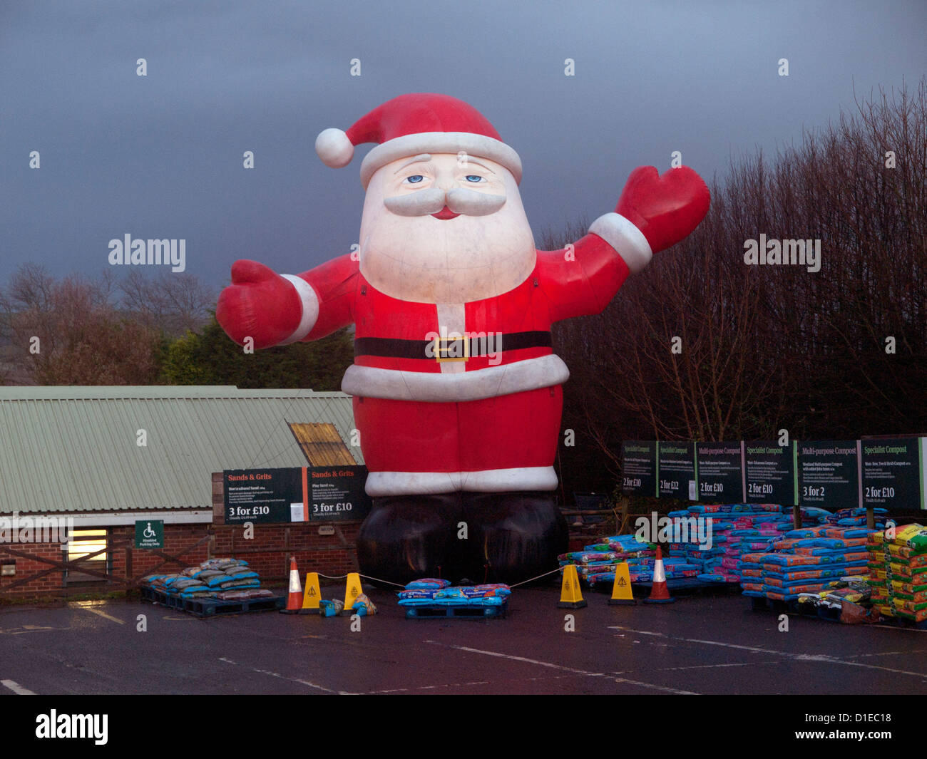 Inflatable Santa outside a garden center in England Stock Photo - Alamy