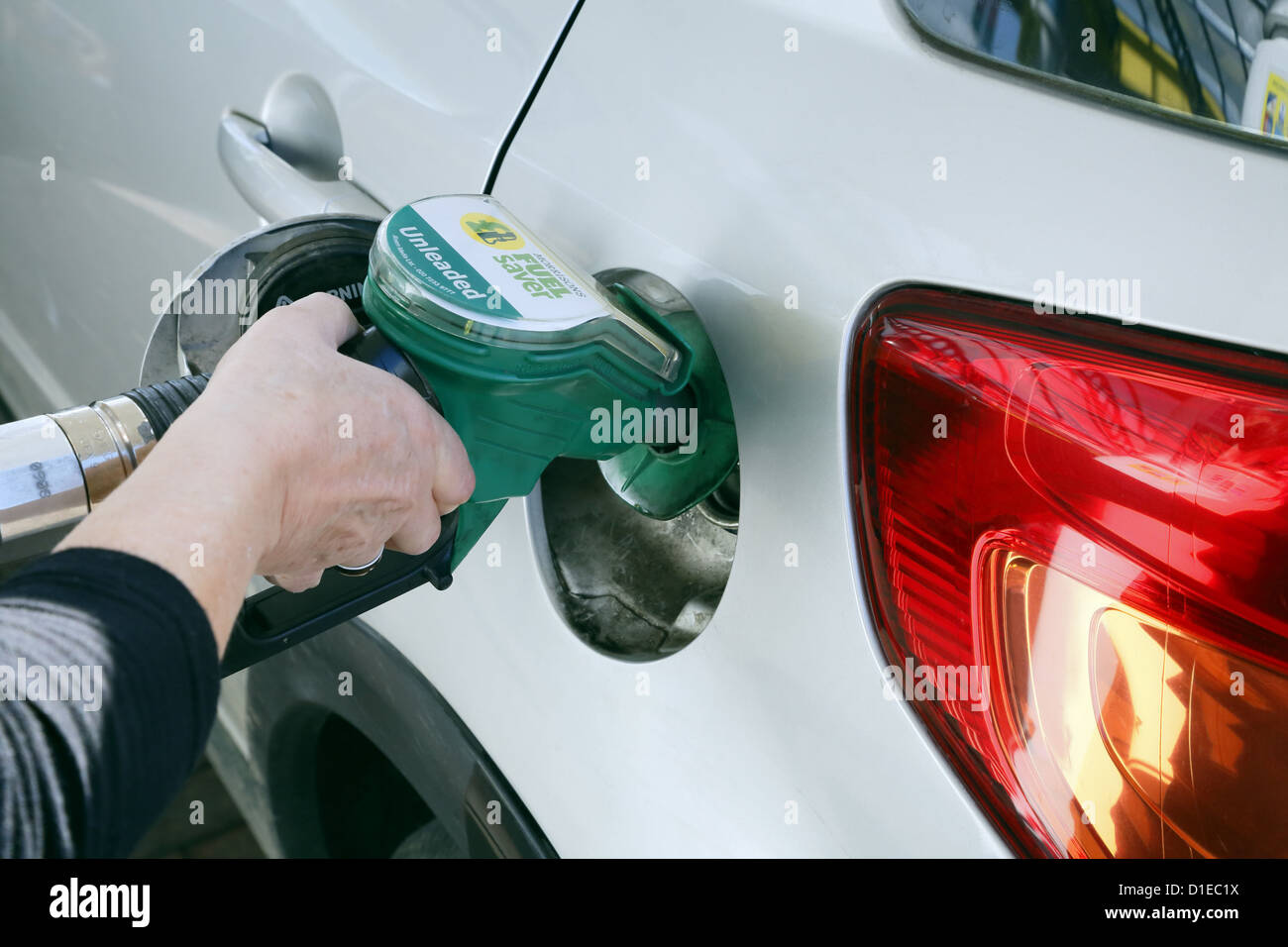 Filling car with petrol Stock Photo - Alamy